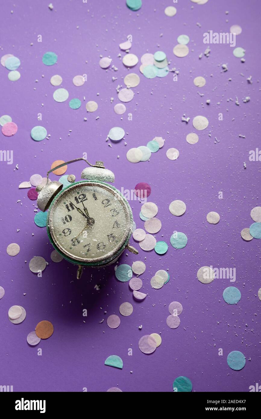 Vintage alarm clock on festive background Stock Photo - Alamy