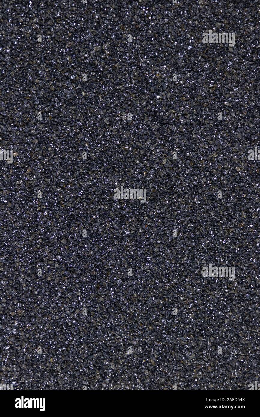 Layer of black crystals covering full frame Stock Photo - Alamy