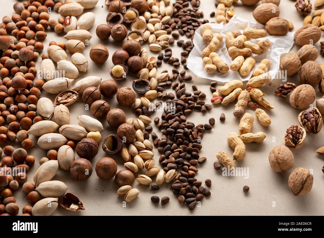 Food background with different nuts Stock Photo - Alamy