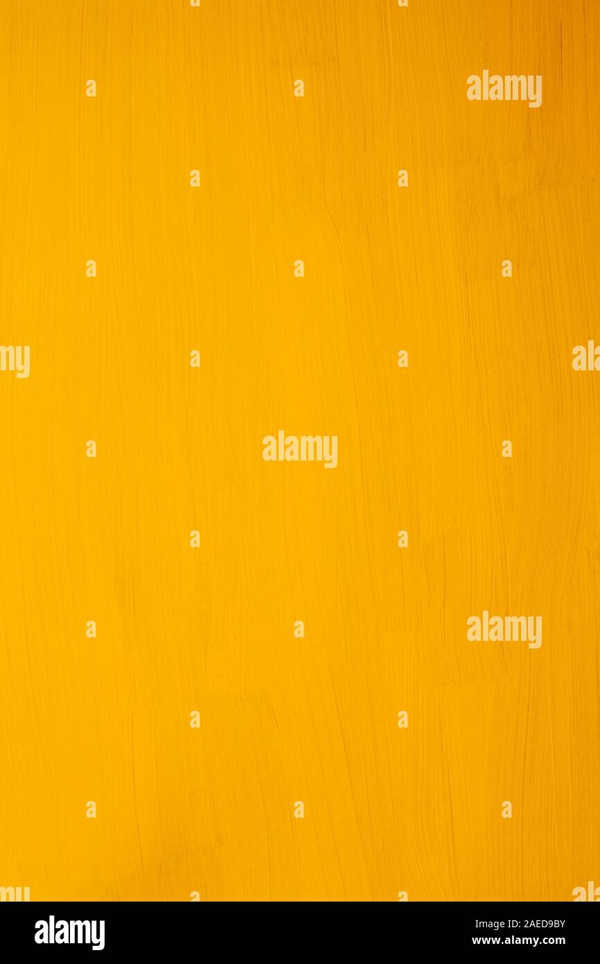 yellow painted paint structure as background painted Stock Photo - Alamy