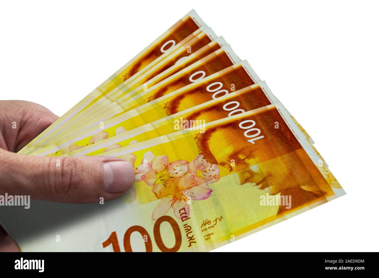 Hand holding Israeli shekels. ILS. Money of Israel Stock Photo - Alamy