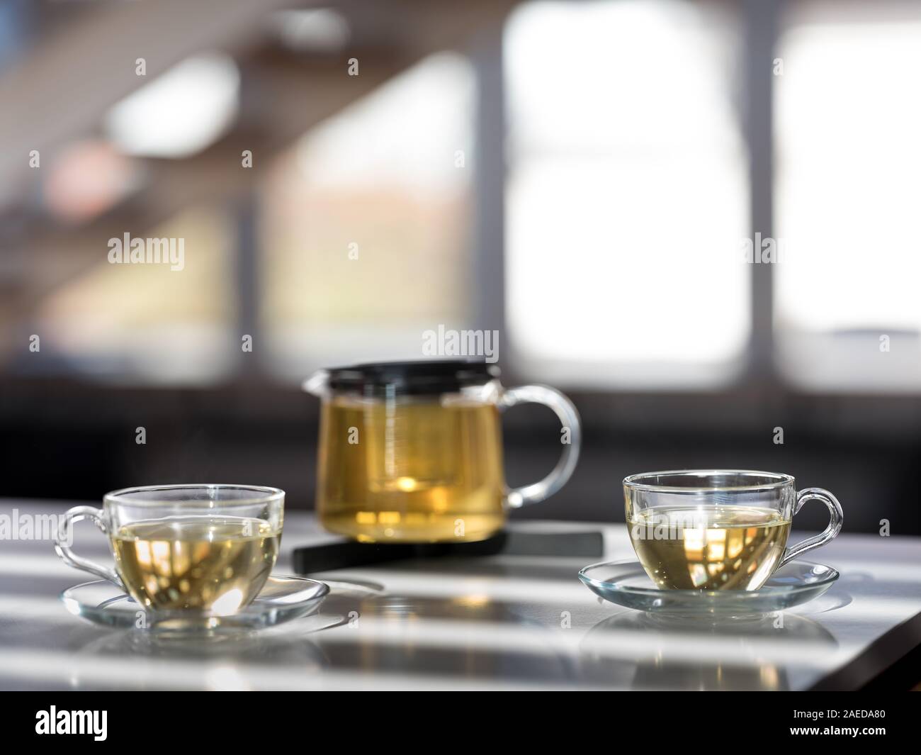 Beautiful glass tea cups and a tea pot close up high resolution Stock ...