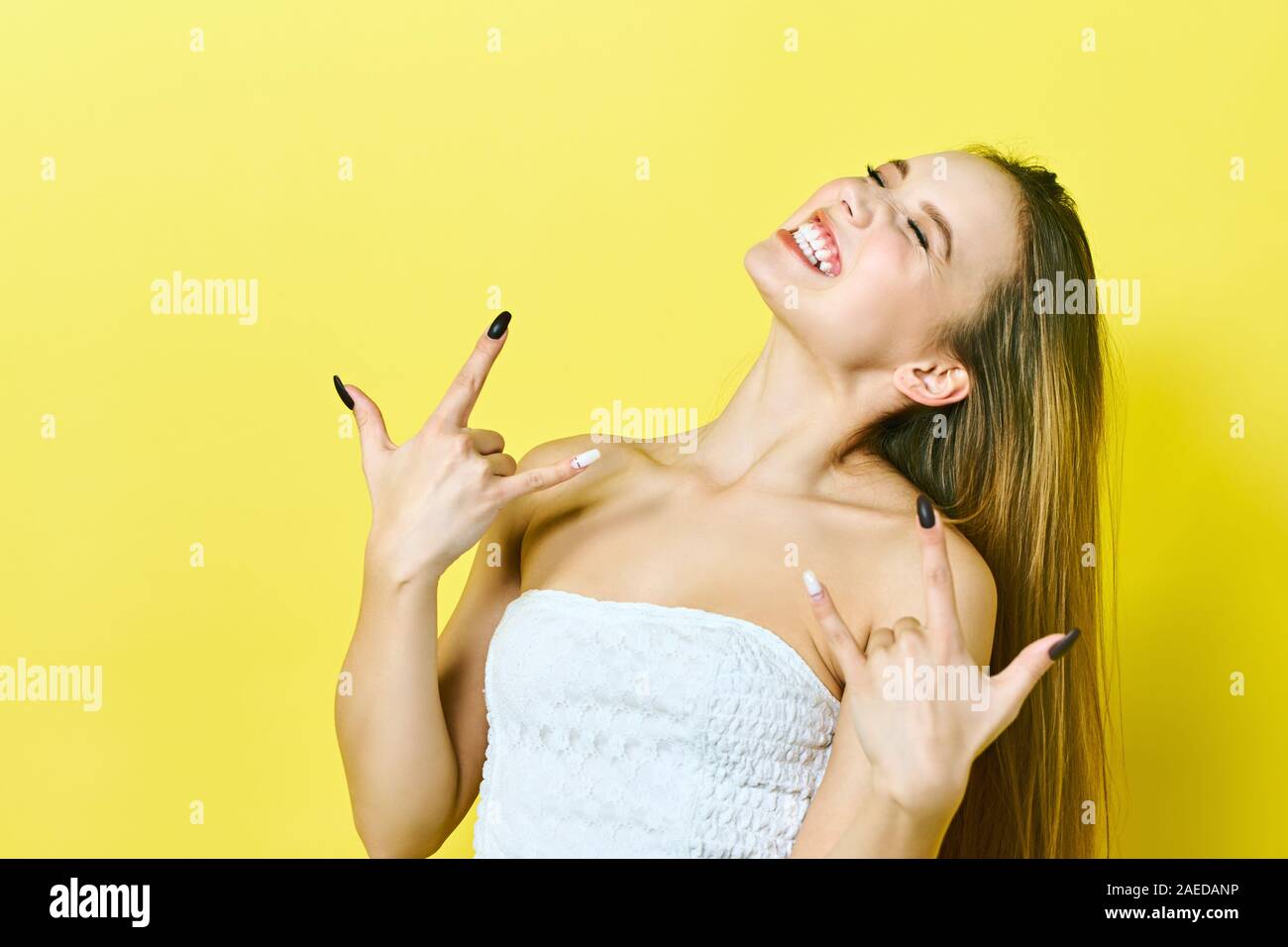 Young crazy lady. Music lover rock fan concept. Close up photo portrait ...