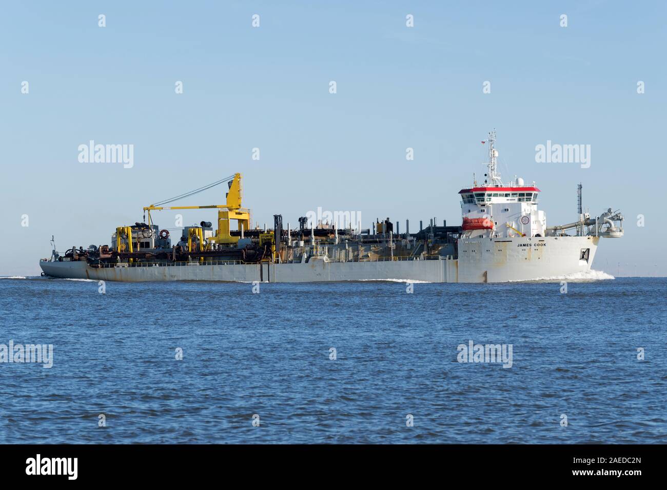 Jan De Nul trailing suction hopper dredger JAMES COOK on the river Elbe ...