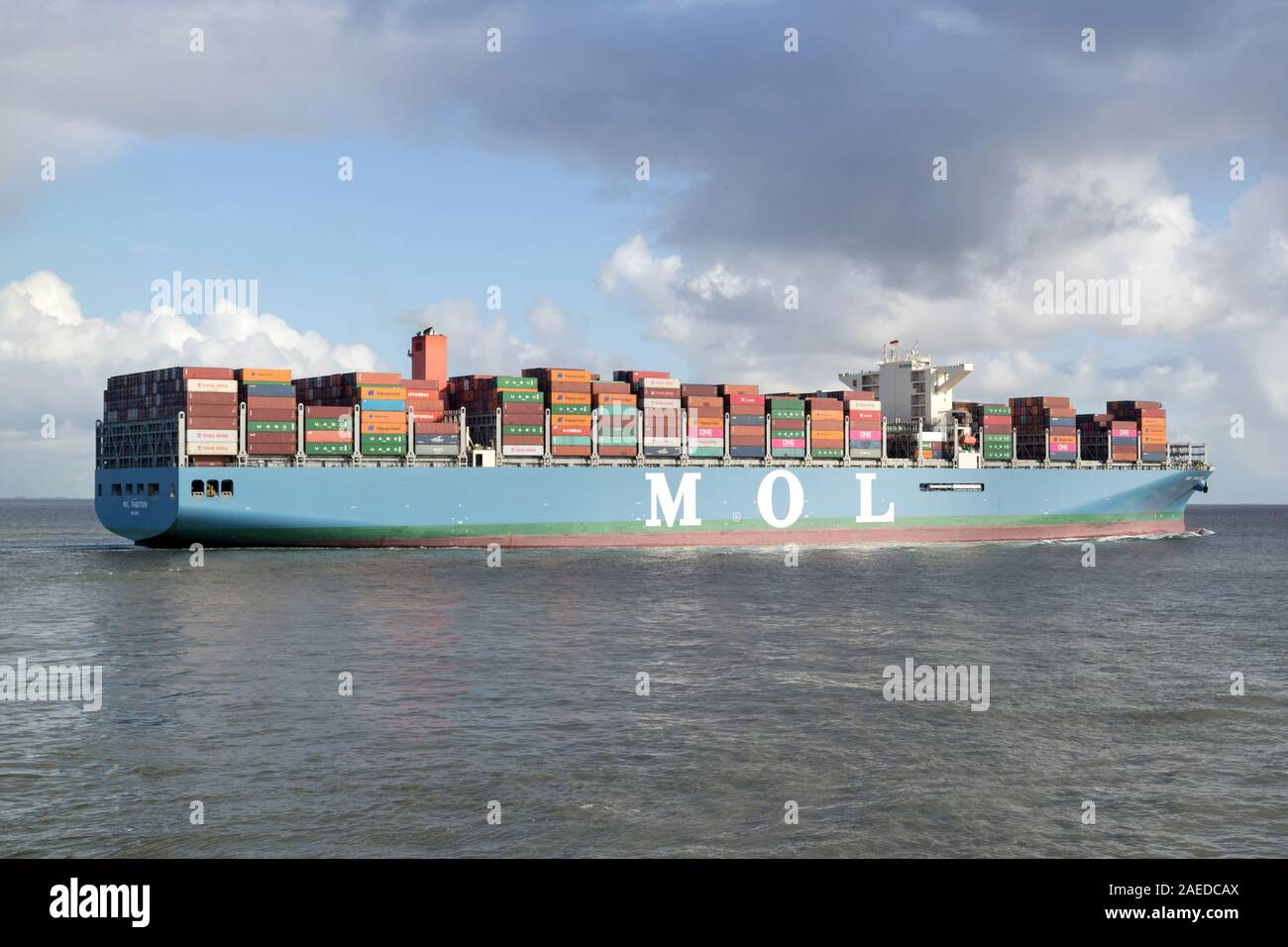 MOL TRADITION on the river Elbe. MOL (Mitsui O.S.K. Lines, Ltd.) is a ...