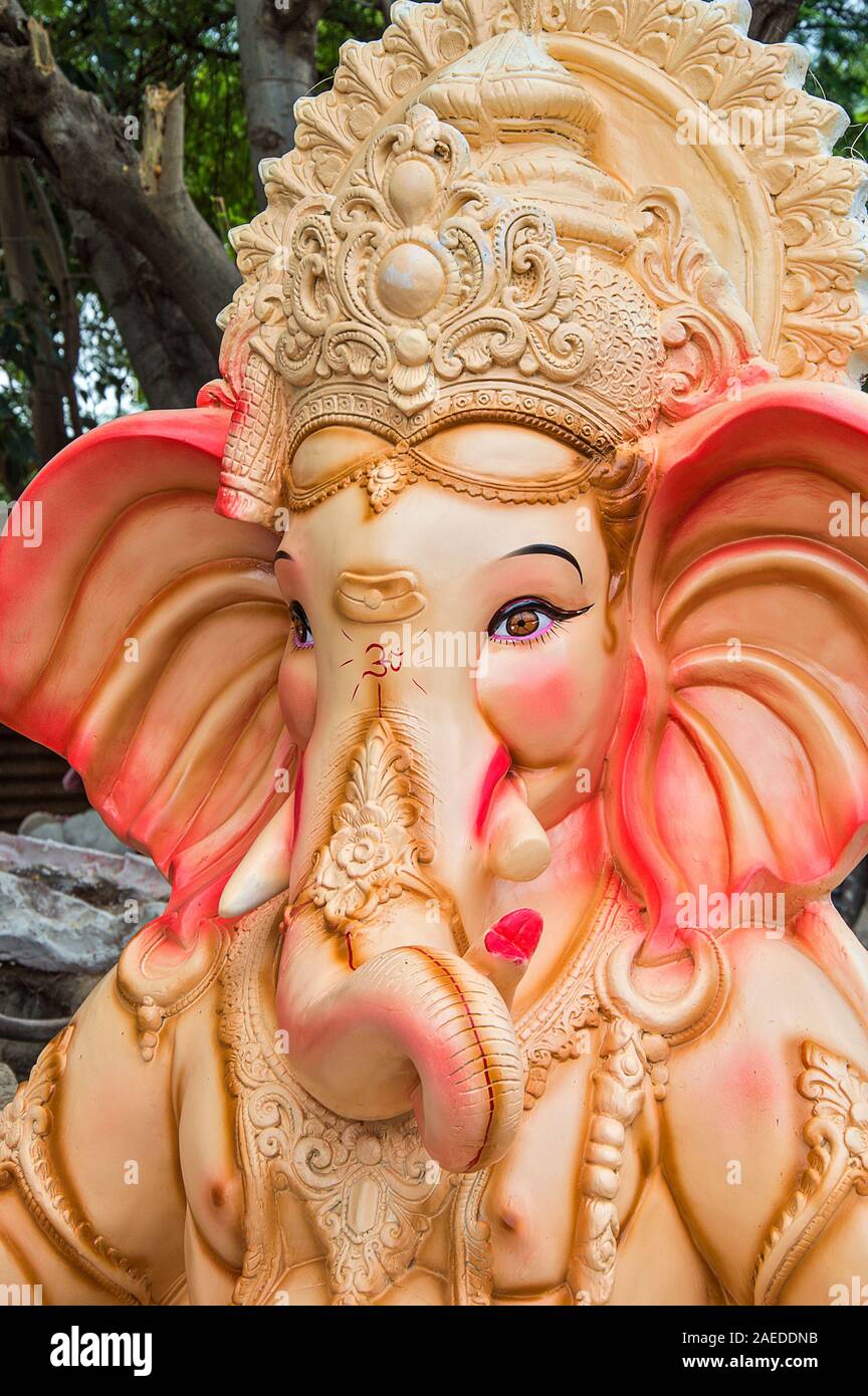 Statue of Hindu God Ganesha. close up of Ganesha Idol at an artist's ...