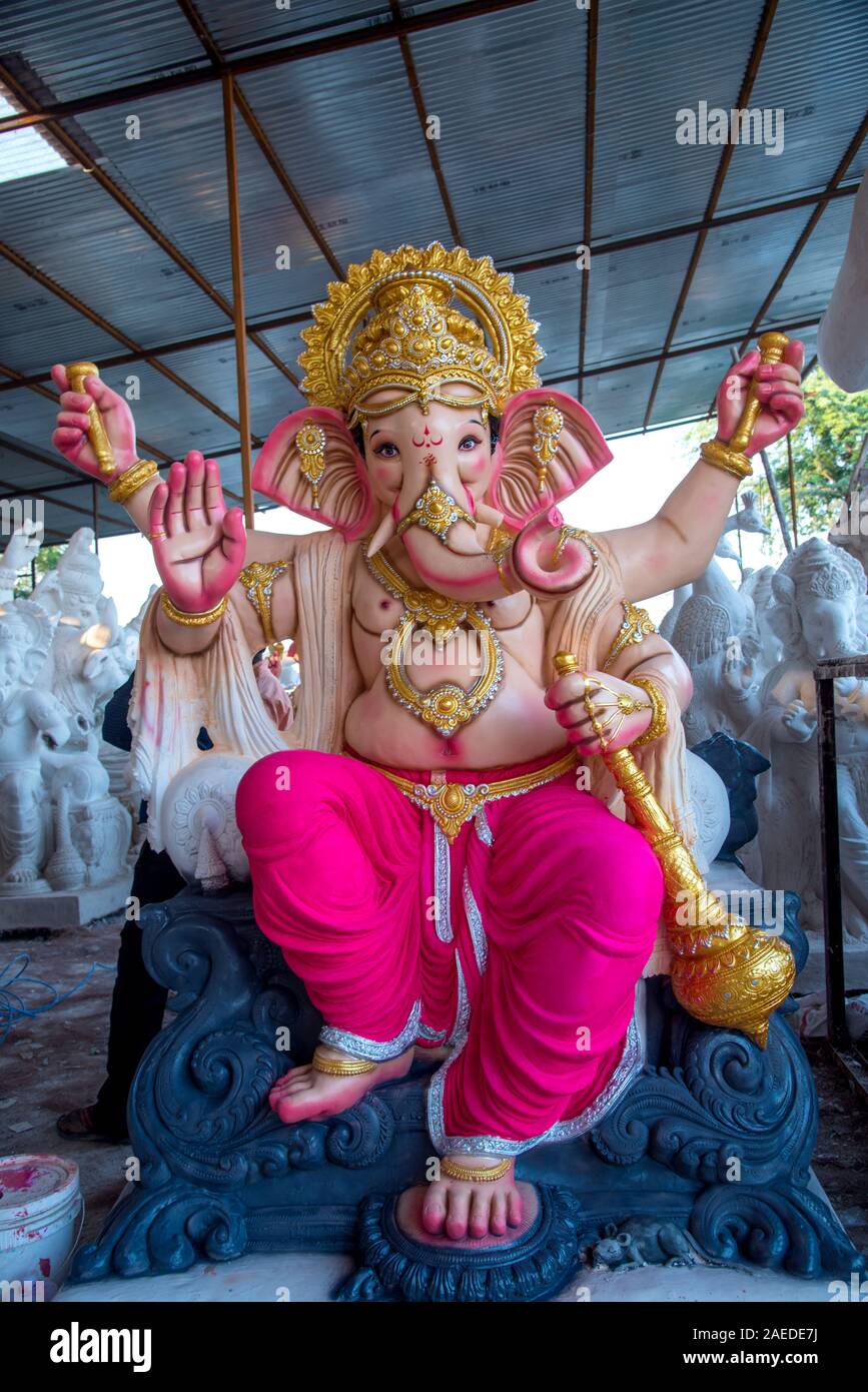 Statue of Hindu God Ganesha. close up of Ganesha Idol at an artist's ...