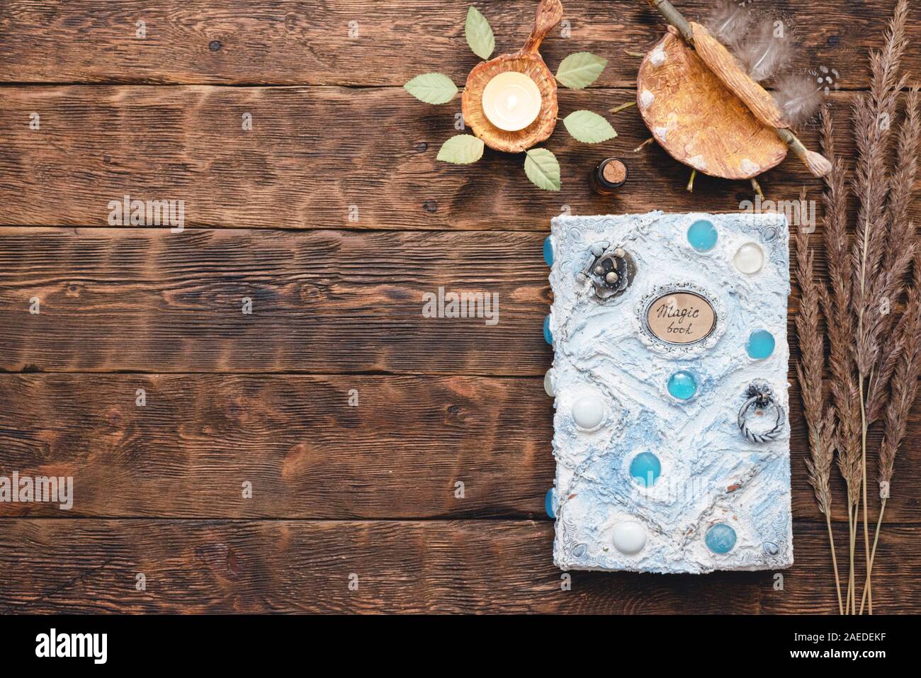 Book of magic on wizard table concept background. Shaman accessories ...