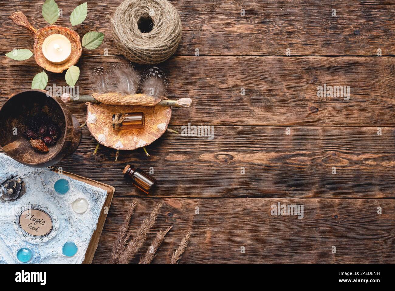 Book of magic on wizard table concept background. Shaman accessories ...