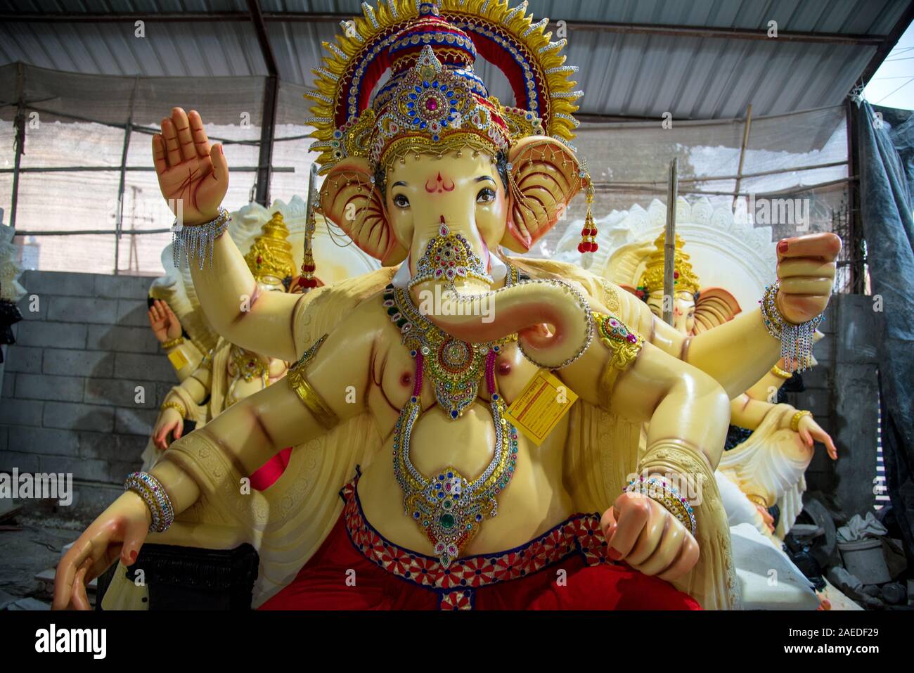 Statue of Hindu God Ganesha. close up of Ganesha Idol at an artist's ...