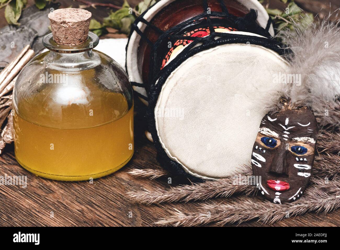 Magic potion in a bottle of wizard table background Stock Photo - Alamy