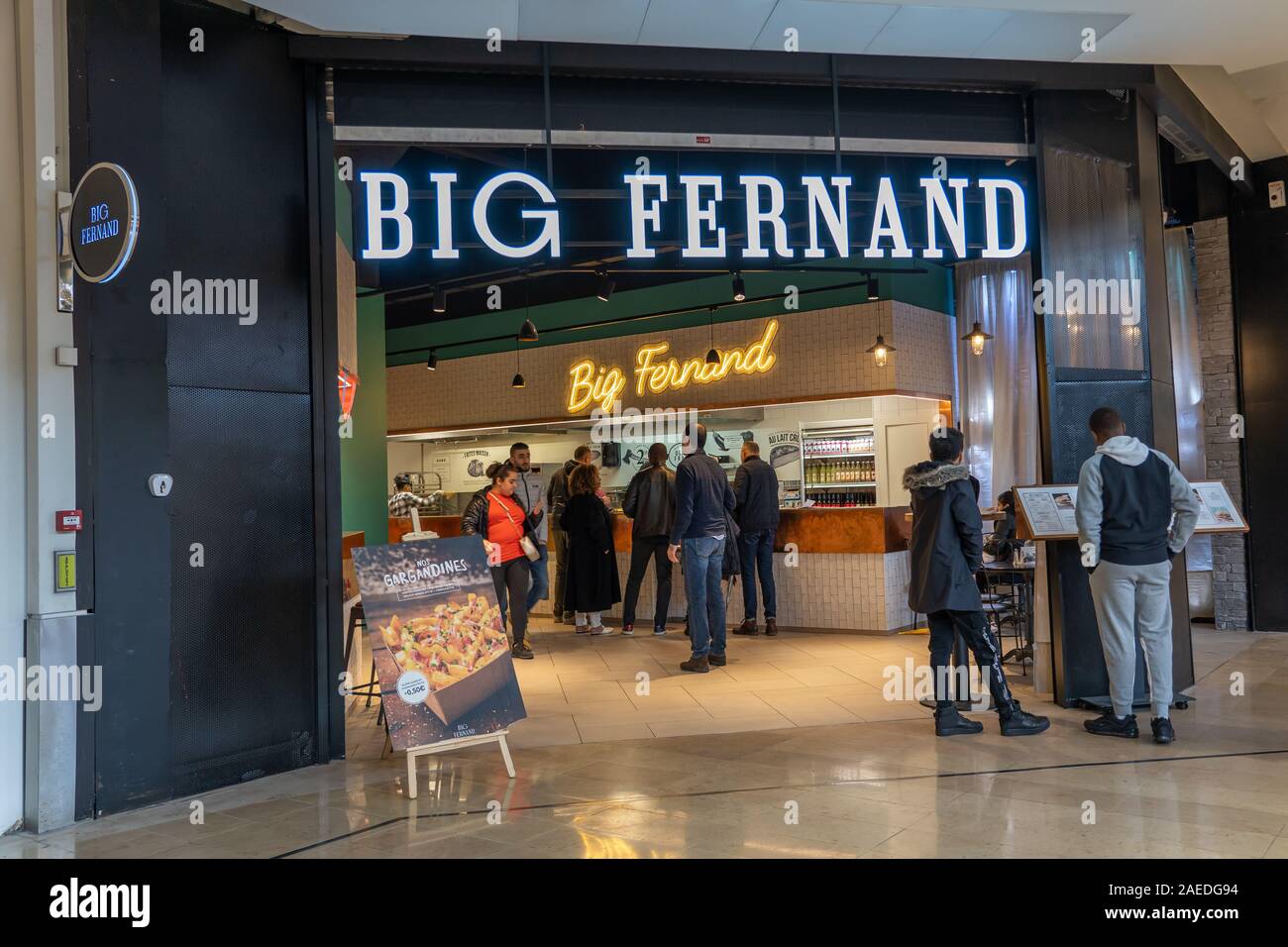 Paris, France - December 8: People order at Big Fernand burger bistrot ...