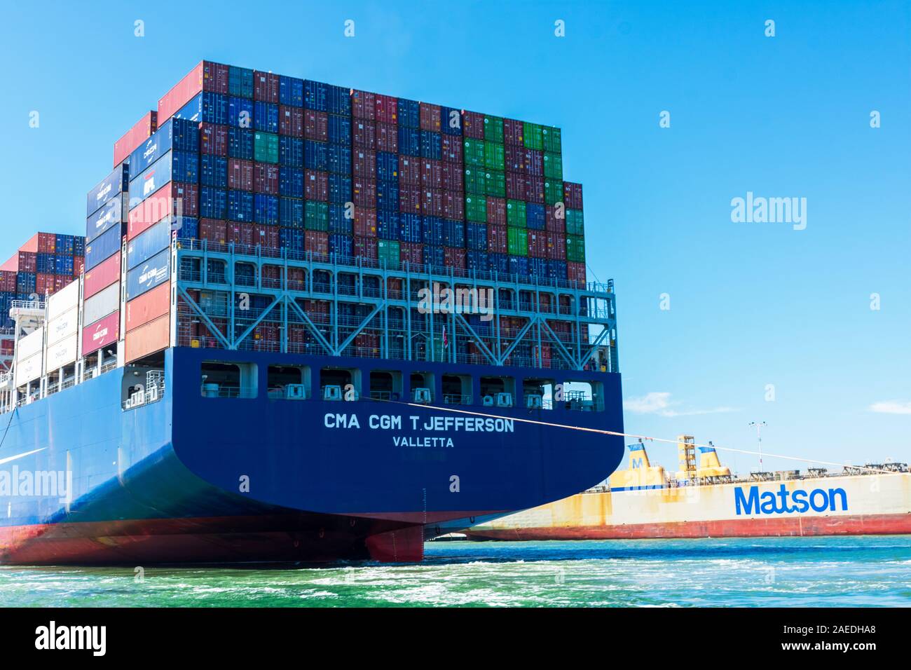 Container ship CMA CGM loaded with shipping containers. Stern view ...