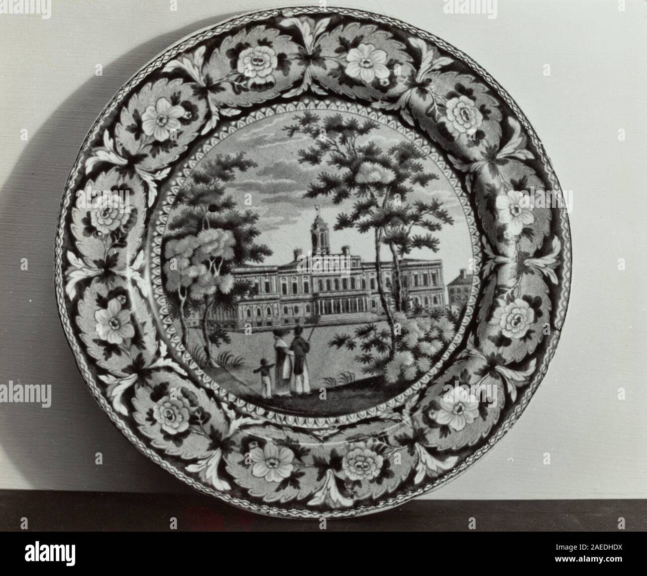 A decorative plate created circa 1936 by Helmut Hiatt featuring City ...
