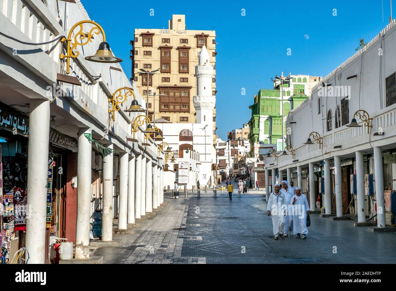 View of the Souk al Alawi Street, the greenish Noorwali coral town ...