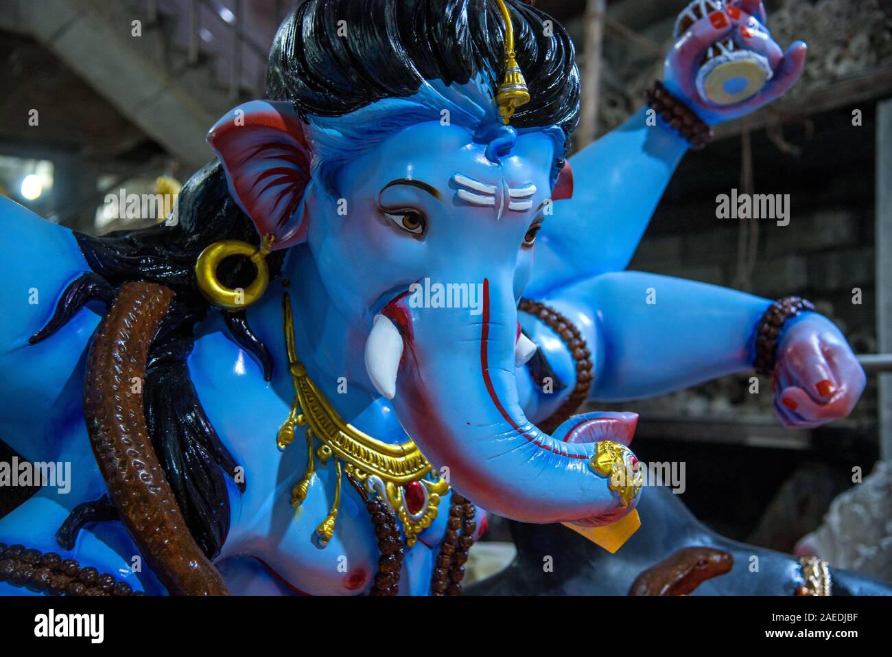 Statue of Hindu God Ganesha. close up of Ganesha Idol at an artist's ...