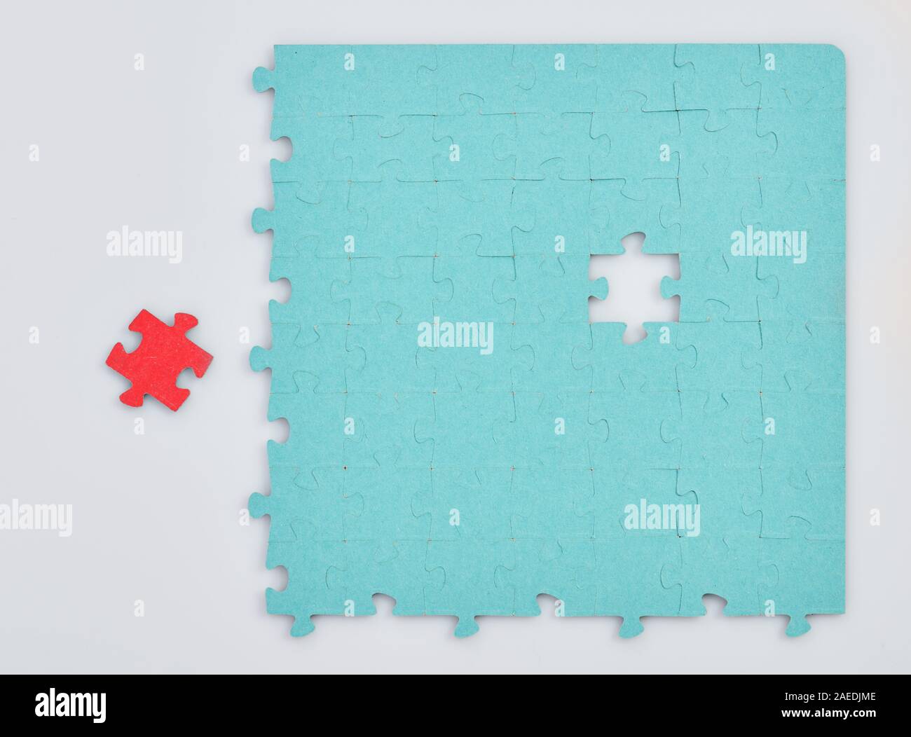 Missing last piece of puzzle isolated on white background Stock Photo ...