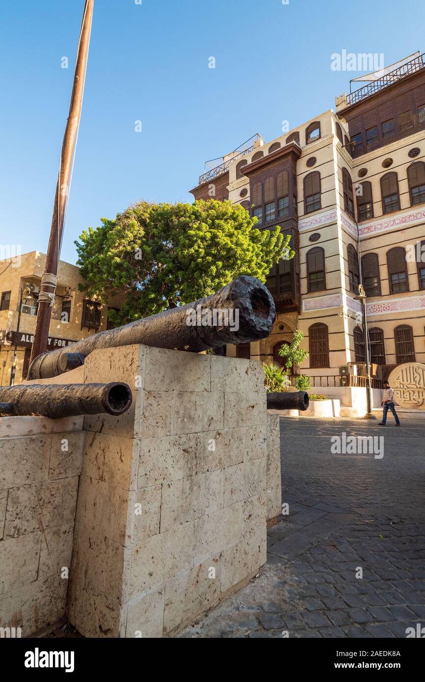 View of cannon in front of the Nasseef coral town house, Souk al Alawi ...