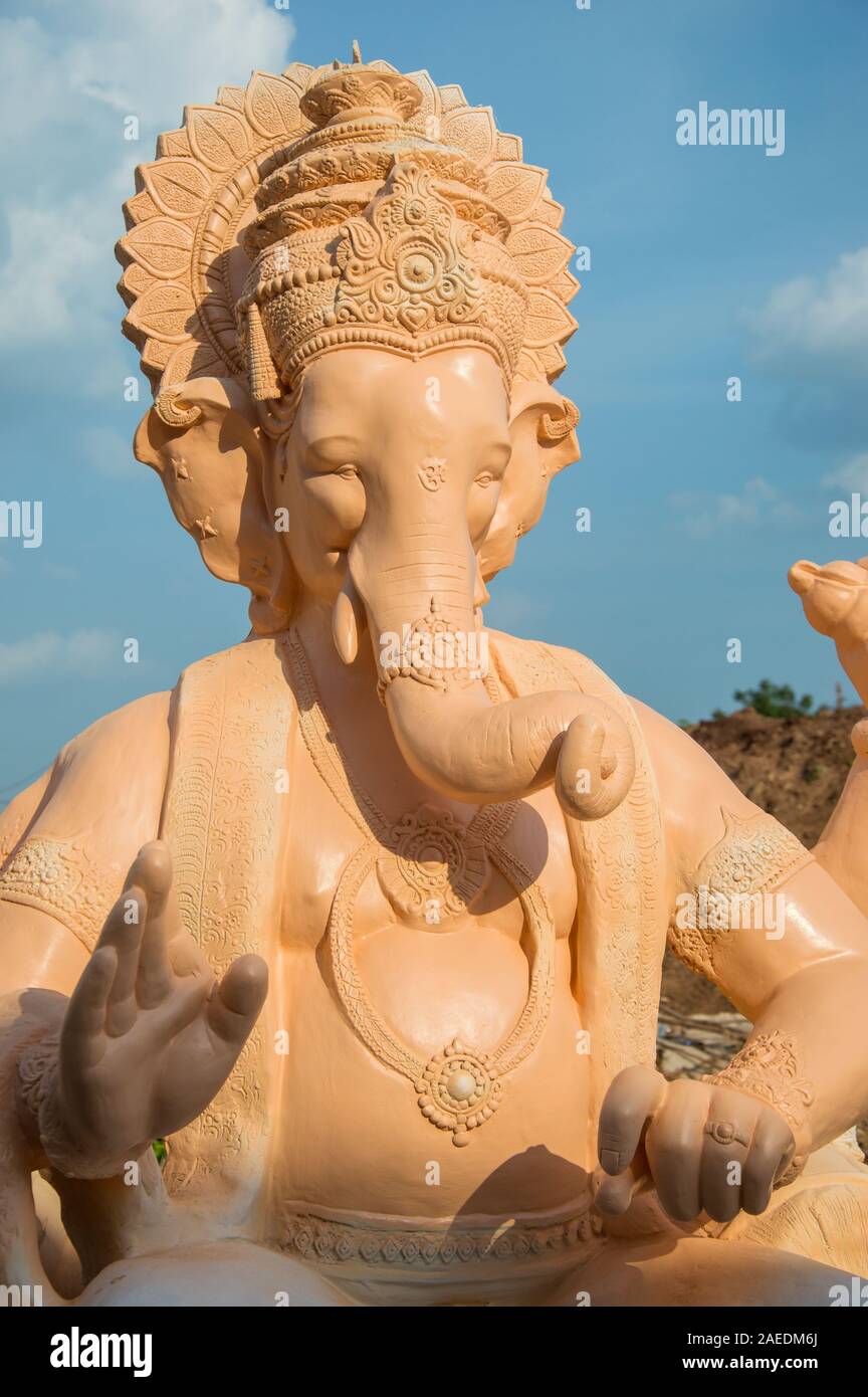 Statue of Hindu God Ganesha. close up of Ganesha Idol at an artist's ...