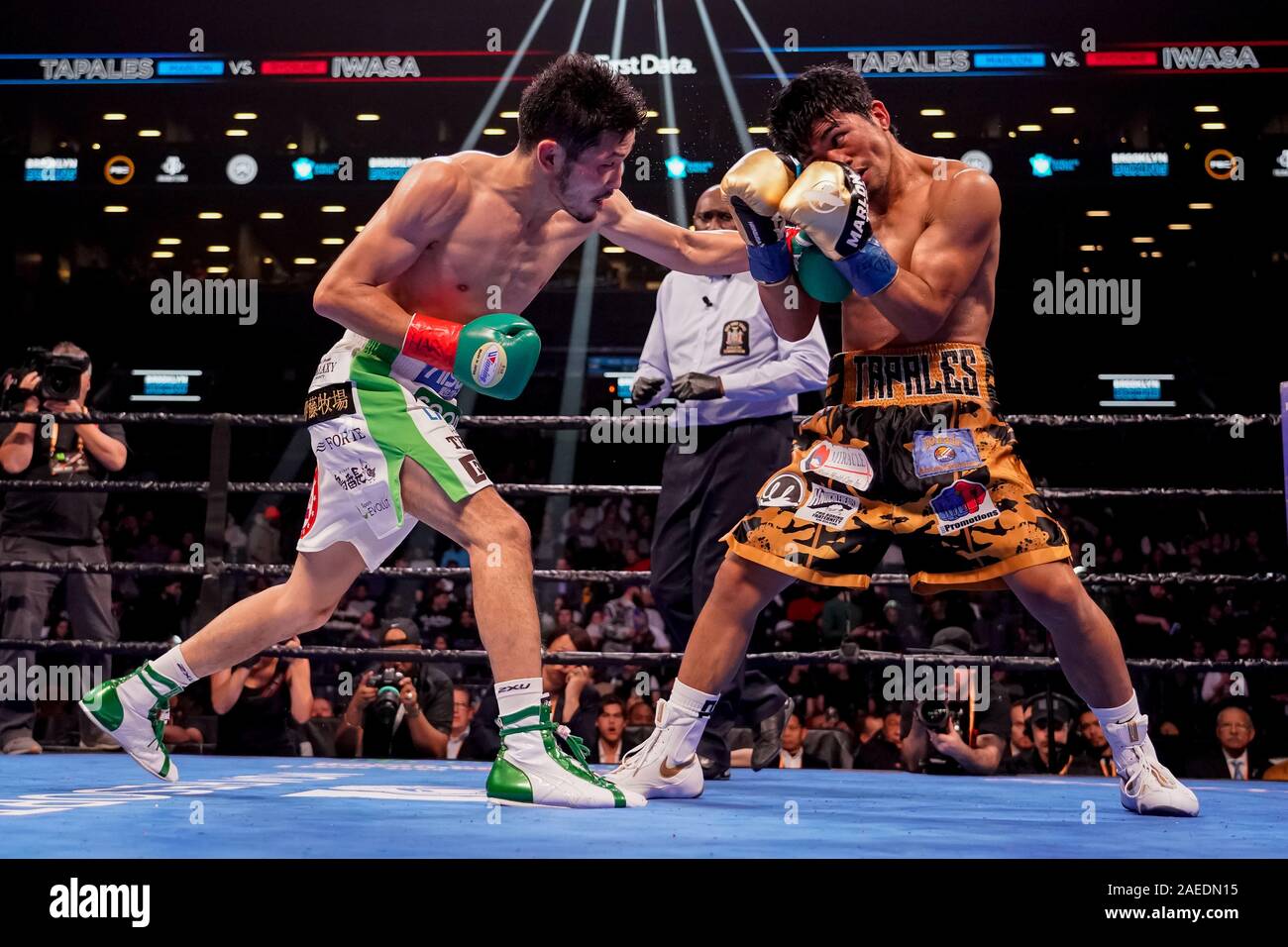 Brooklyn, New York, USA. 7th Dec, 2019. MARLON TAPALES (yellow and ...