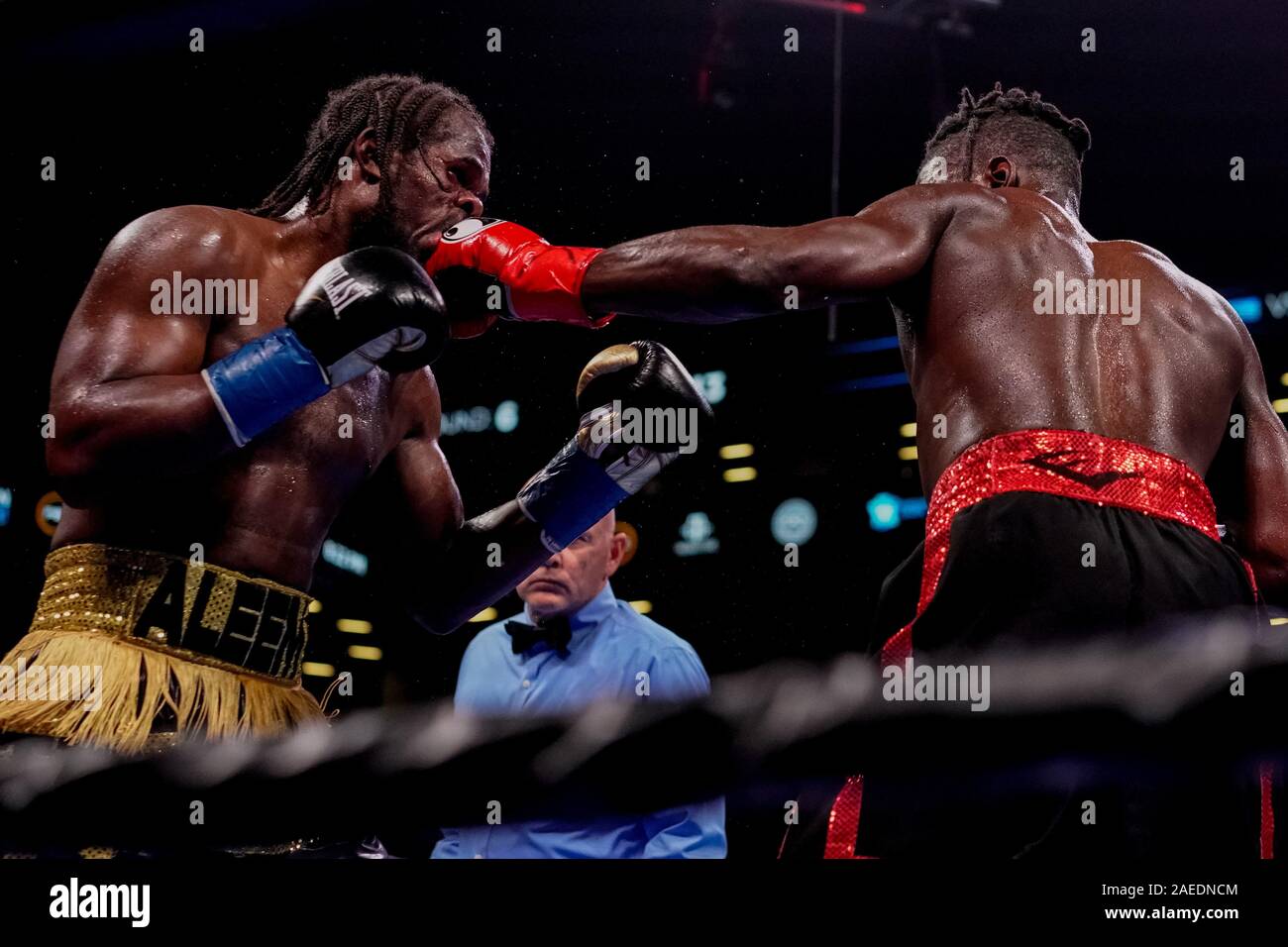Brooklyn, New York, USA. 7th Dec, 2019. IMMANUEL ALEEM (black and gold ...