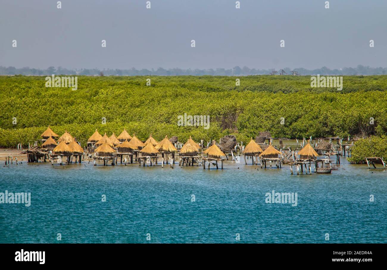 Joal Fadiouth, ancient millet loft in piles stands above sea level in ...