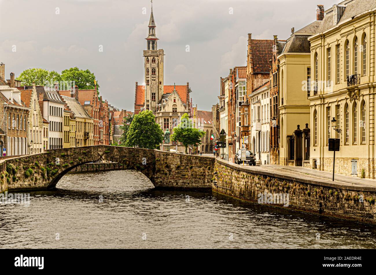 View of a canal with its bridge and in the background a church ...