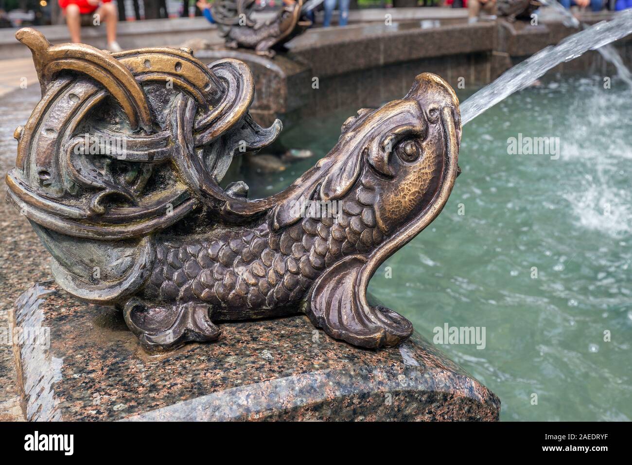 Bronze fountain fish with a stream of water in Kiev, Ukraine Stock ...