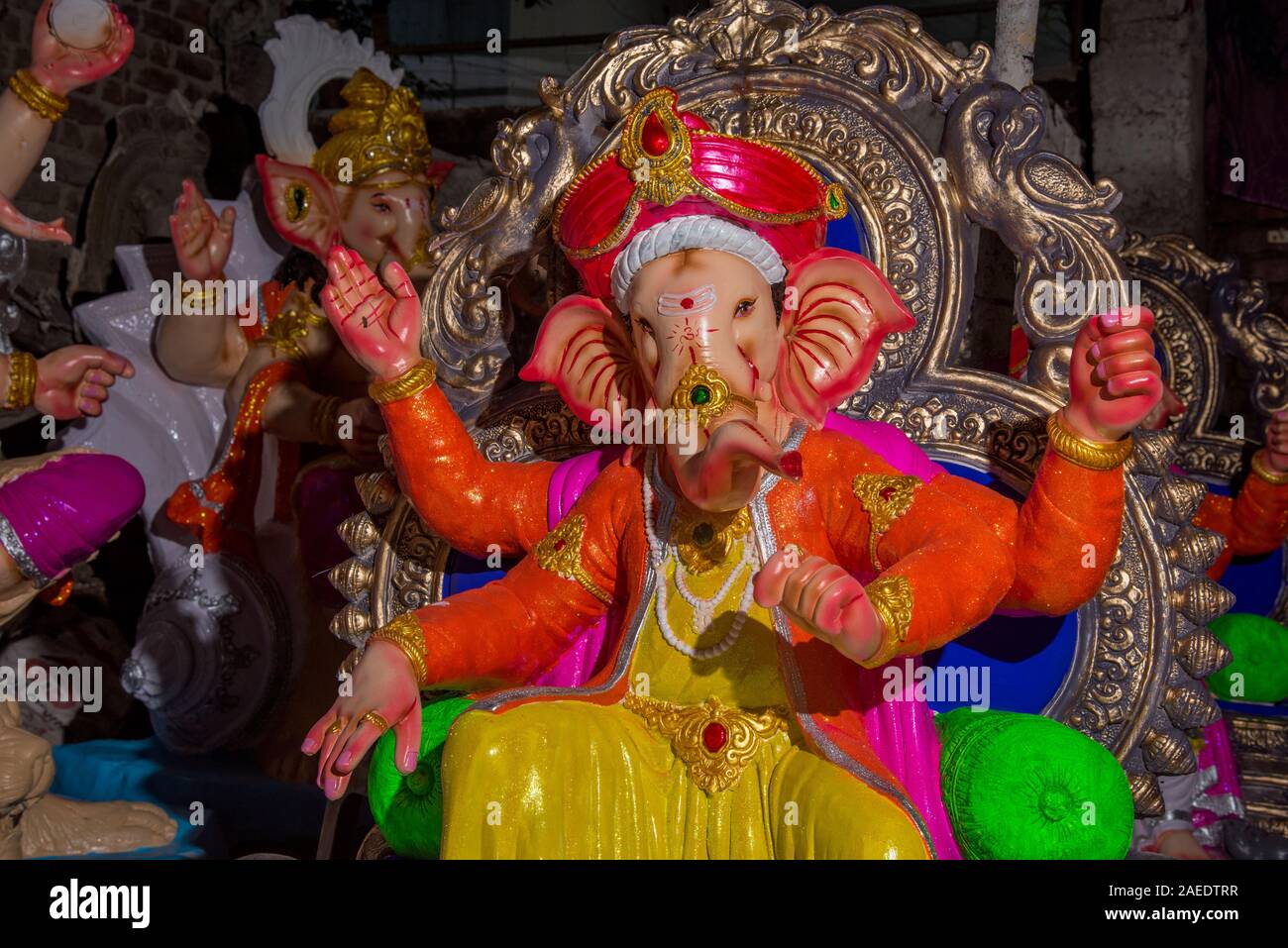 Statue of Hindu God Ganesha. close up of Ganesha Idol at an artist's ...