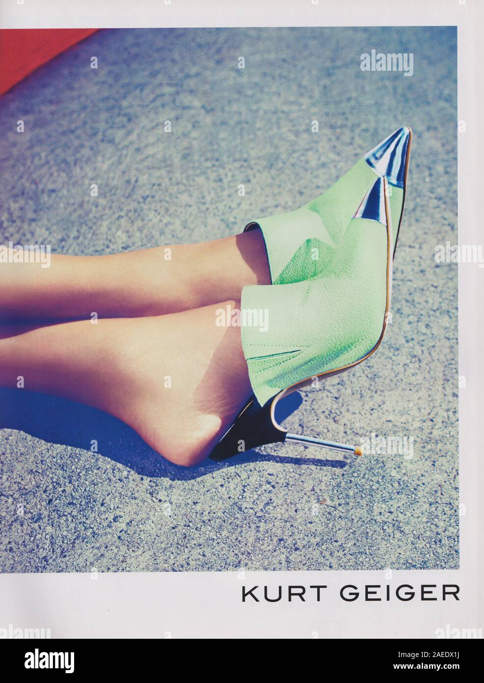 poster advertising Kurt Geiger fashion house with Anja Rubik in paper ...