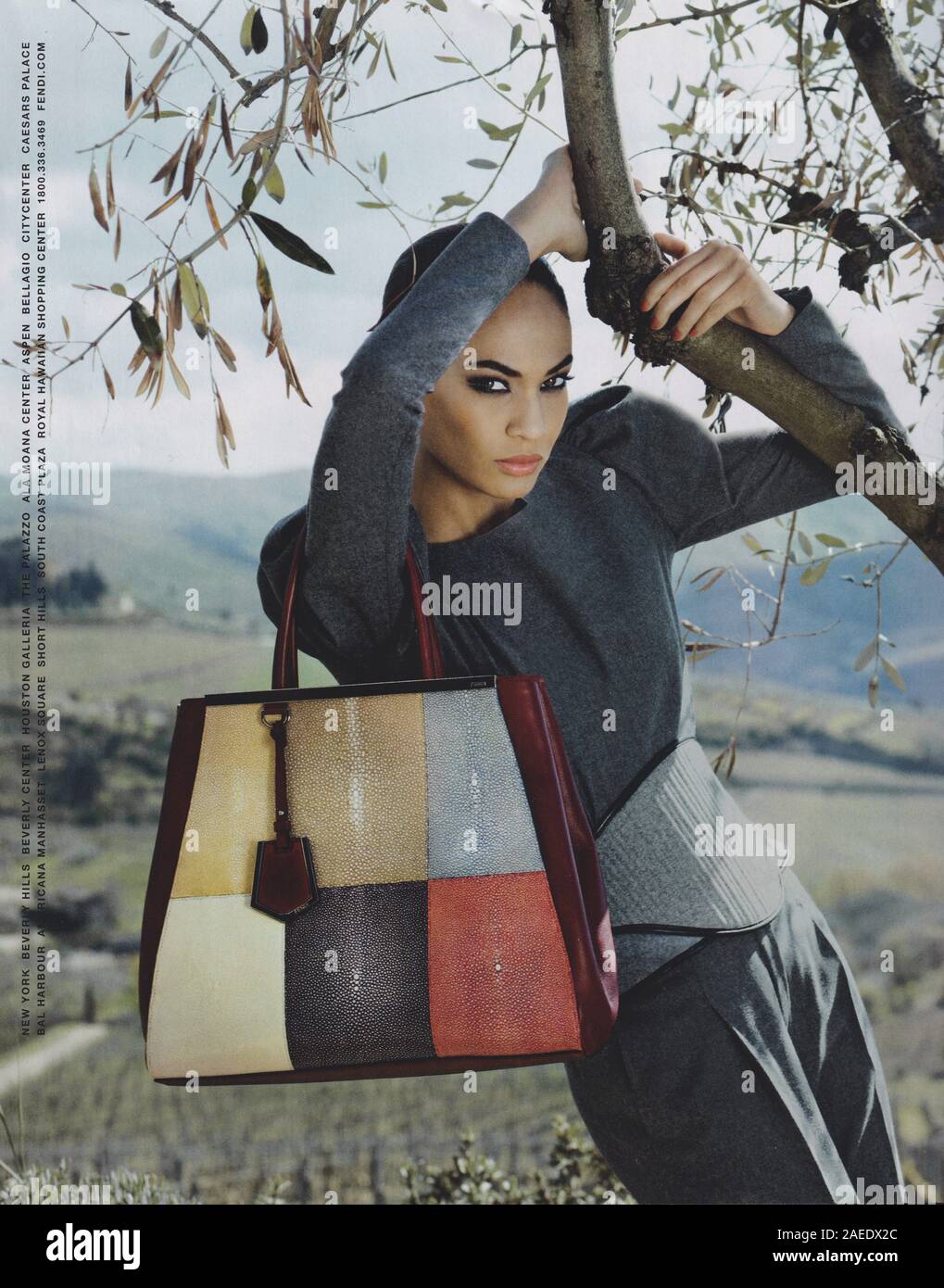 poster advertising FENDI fashion house with Joan Smalls in paper ...