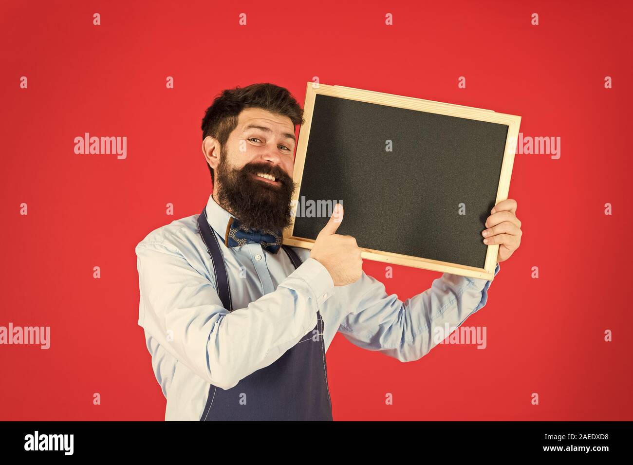 great cuisine. cooking by recipe. bearded hipster cook in apron. happy ...