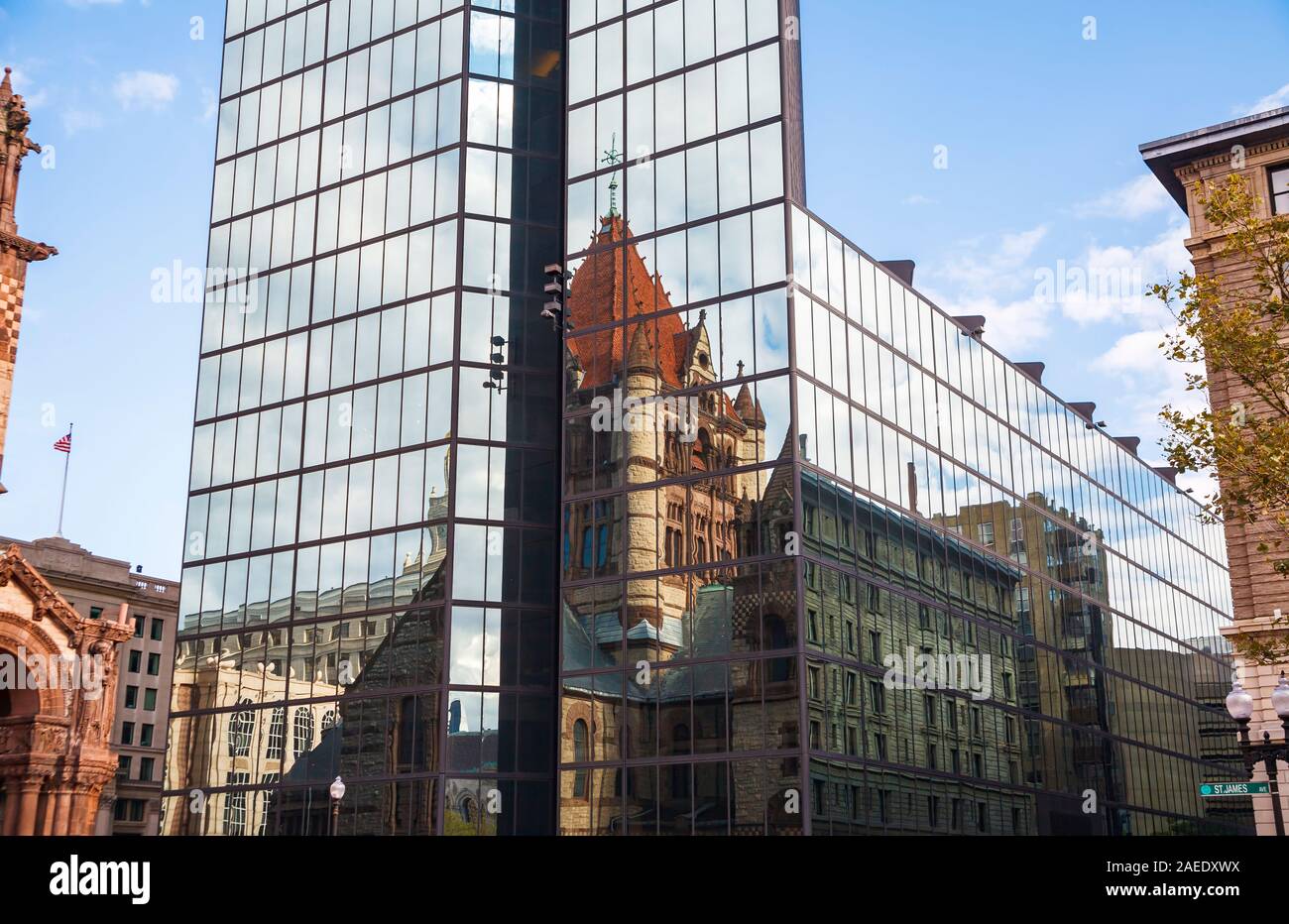 Historic Trinity Church in Copley Square, Back Bay District, reflected ...