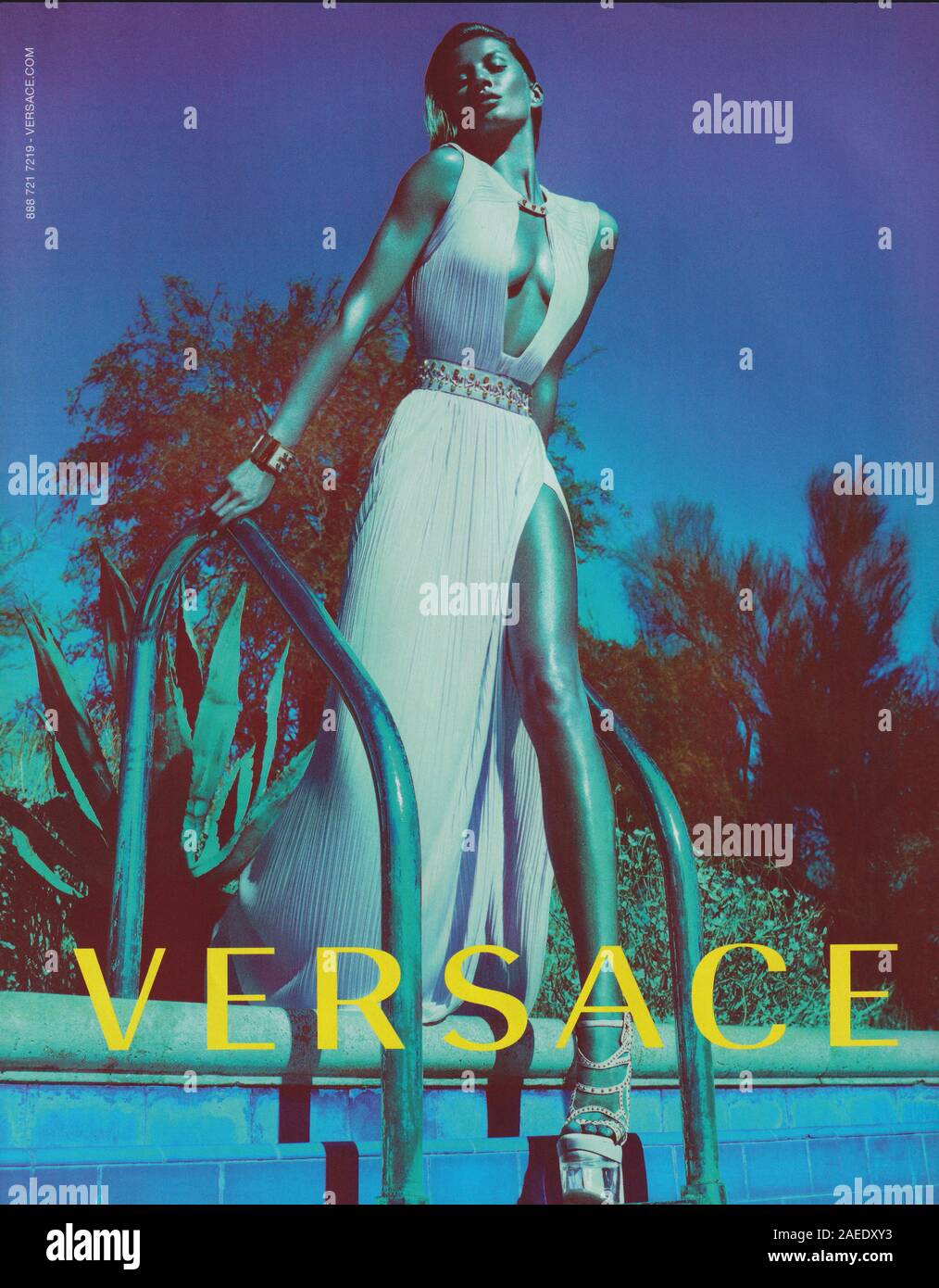poster advertising VERSACE fashion house with Gisele Bundchen in paper ...