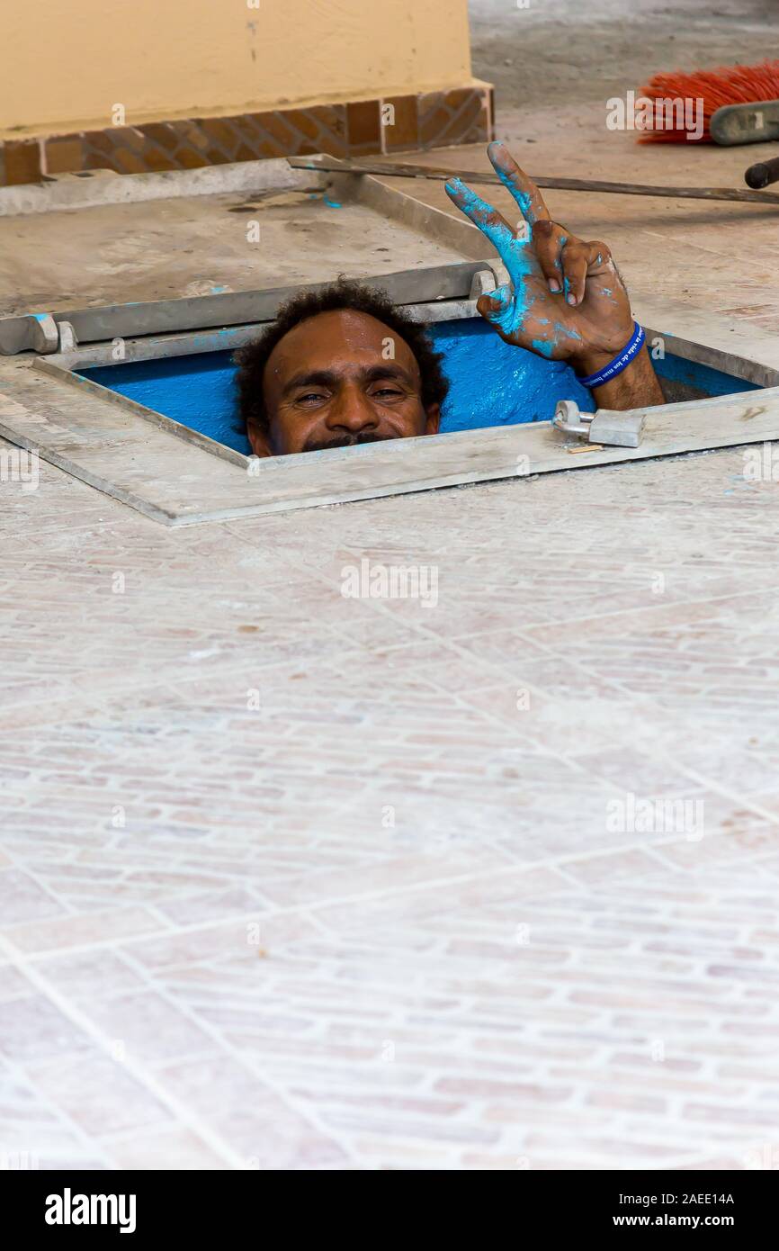 December 6, 2019, Ocoa, Dominican Republic. dominican man painting ...
