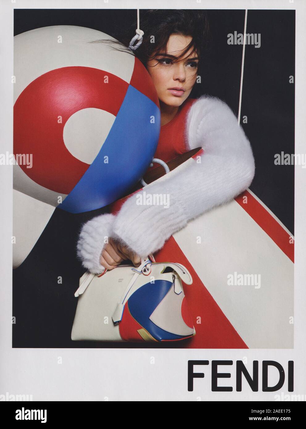 poster advertising FENDI fashion house with Kendall Jenner in paper ...