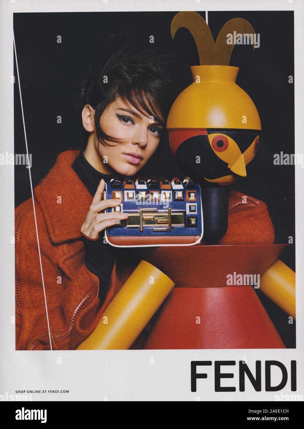 poster advertising FENDI fashion house with Kendall Jenner in paper ...