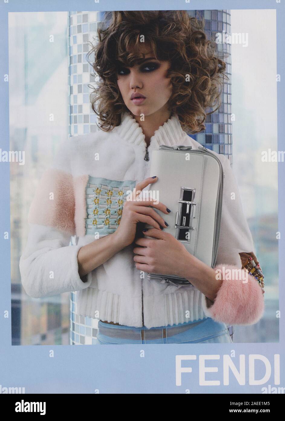 poster advertising FENDI fashion house with Lindsey Wixson in paper ...