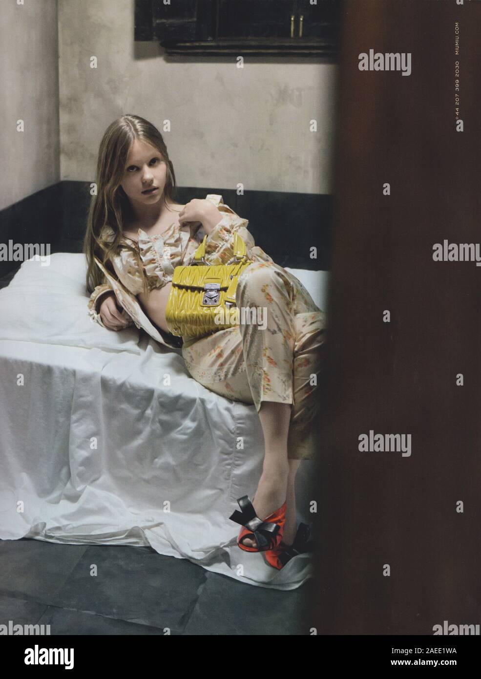 poster advertising Miu Miu fashion house with Mia Goth in paper ...