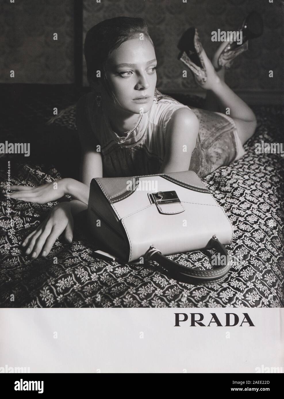 poster advertising PRADA fashion house with Ine Neefs in paper magazine ...