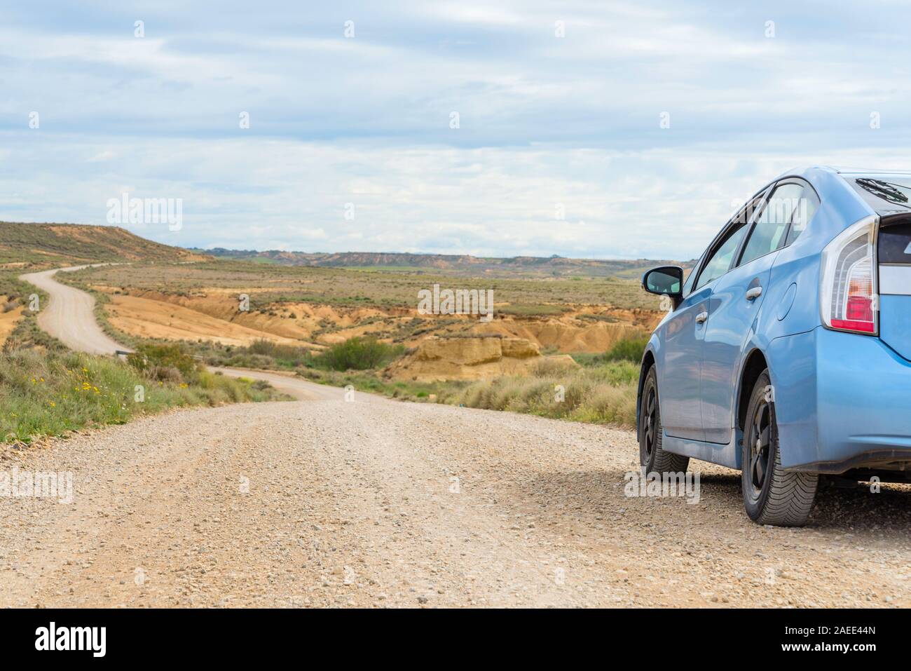 Car on the road through the badlands Bardenas Reales Stock Photo - Alamy