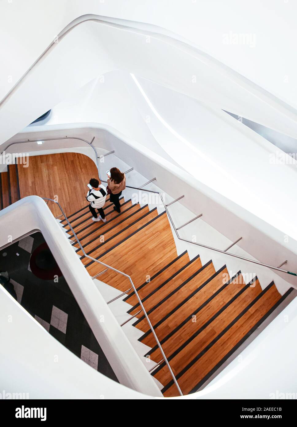 DEC 11, 2015 Seoul, South Korea - People walking on Spiral stair of ...