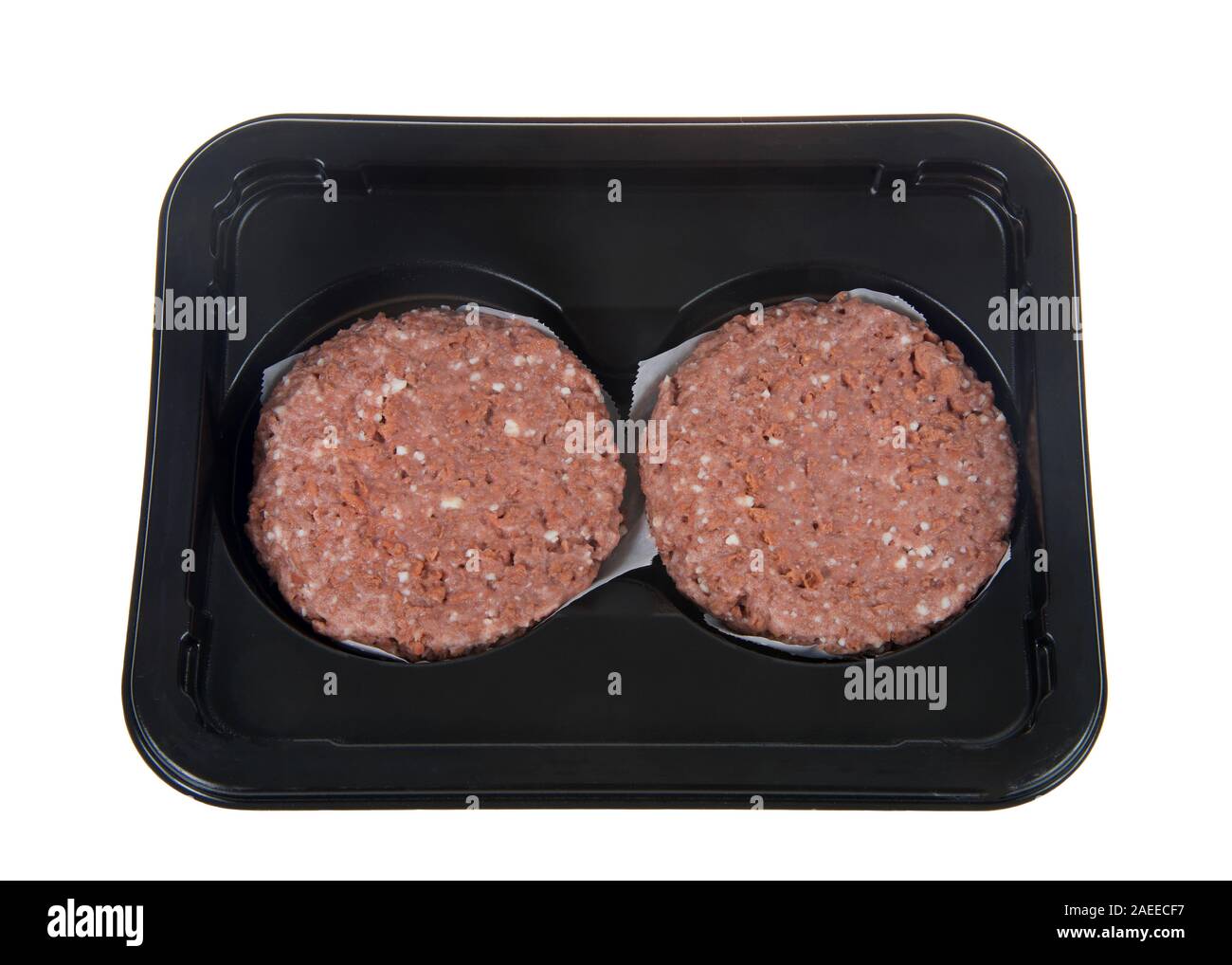 package of vegetable based burger patties, isolated on white. The first ...