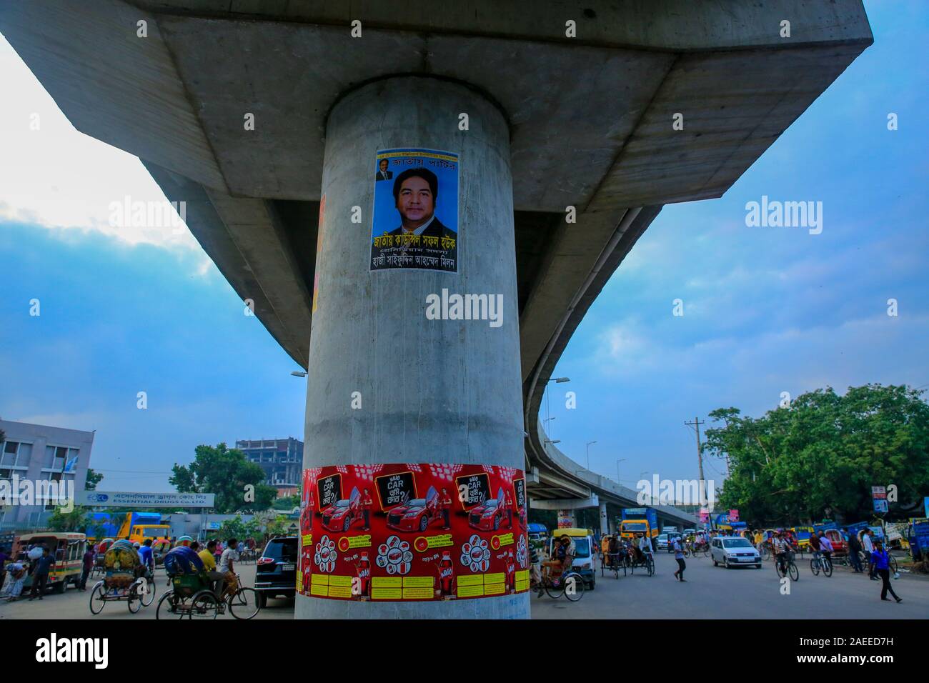 Pillars of Moghbazar-Mouchak Flyover are covered with advertising ...