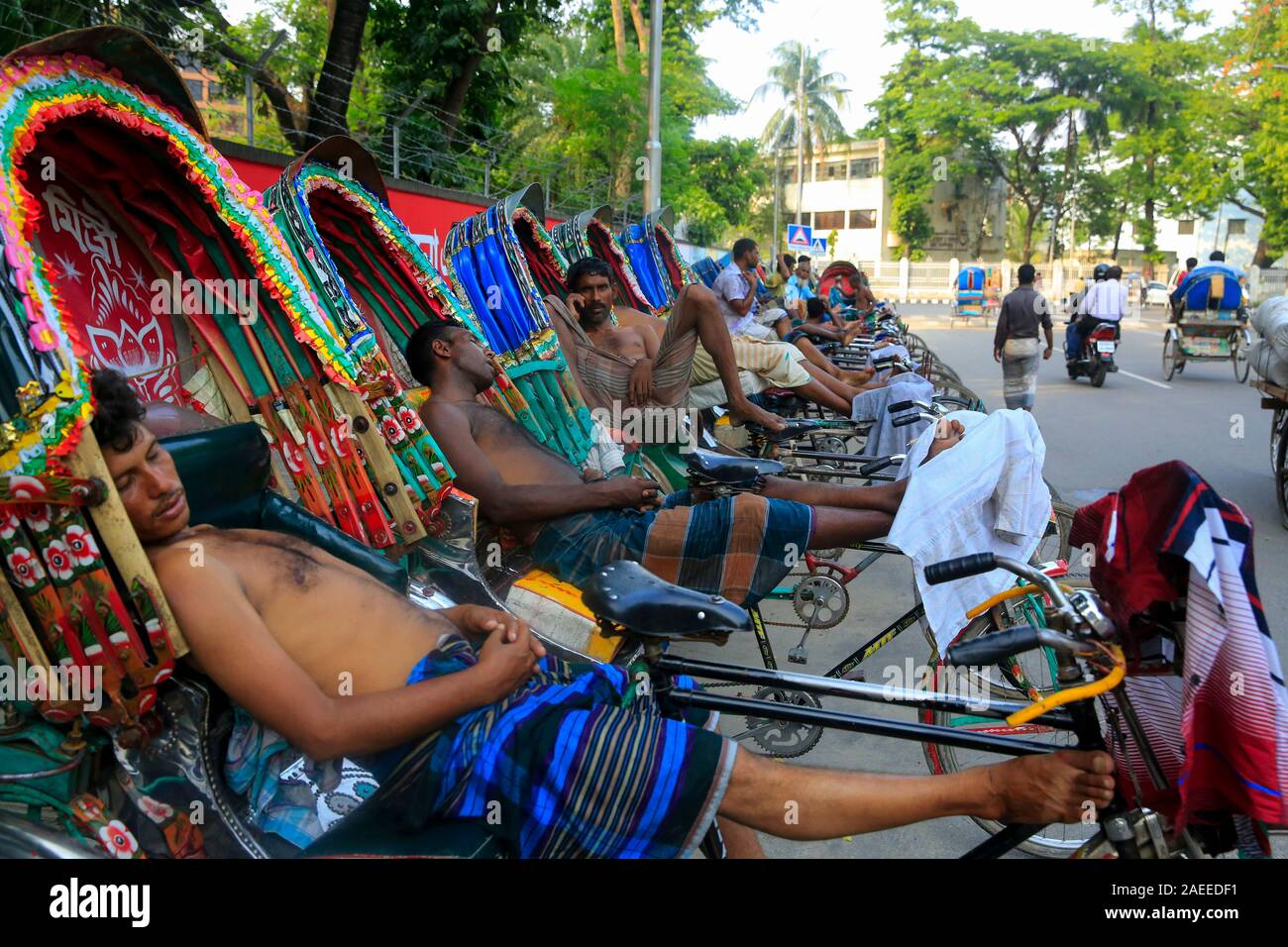 Rickshaw pullers hi-res stock photography and images - Alamy