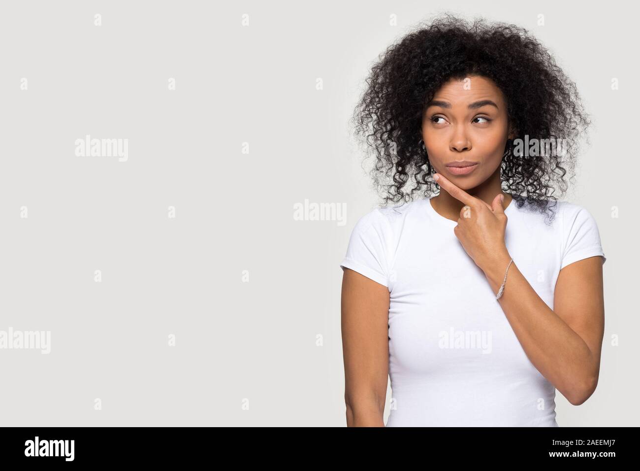 Woman touch chin hi-res stock photography and images - Alamy