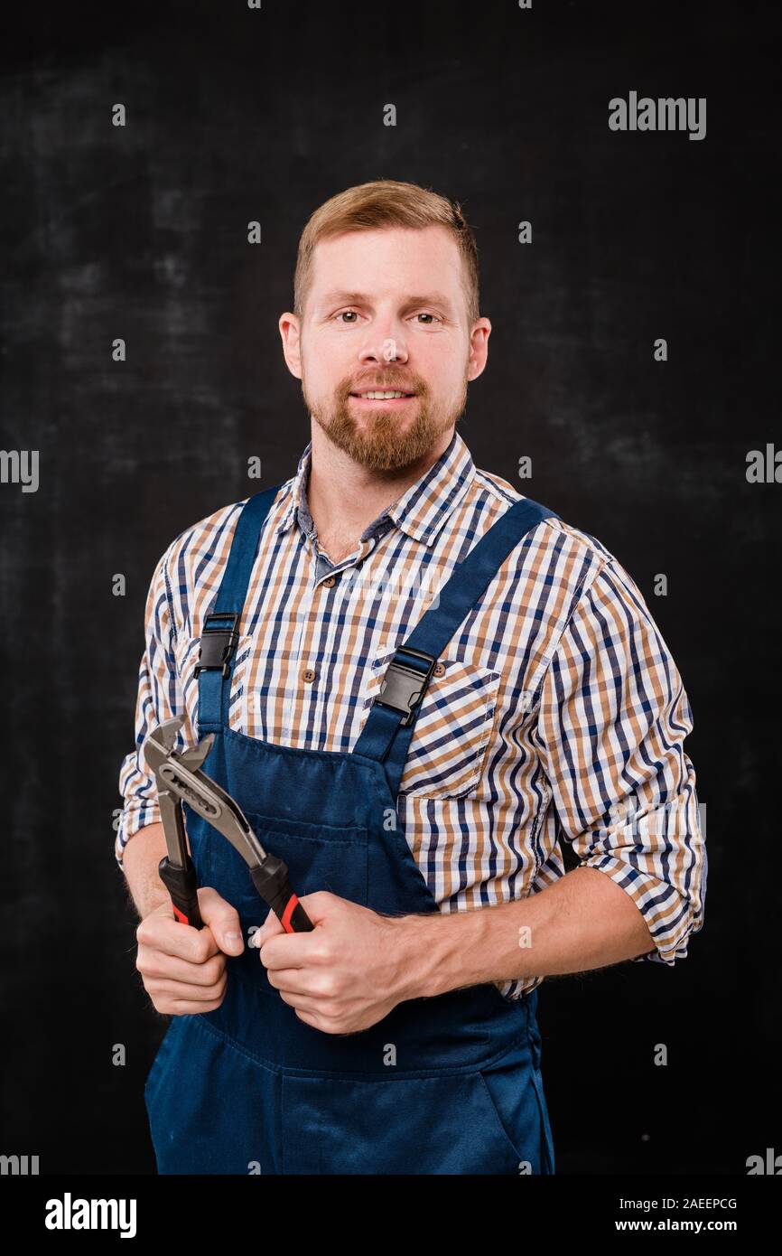 Man in bib overalls hi-res stock photography and images - Alamy