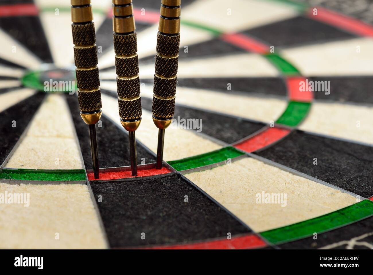 Dartboard with arrows in triple point score circle area close up Stock ...