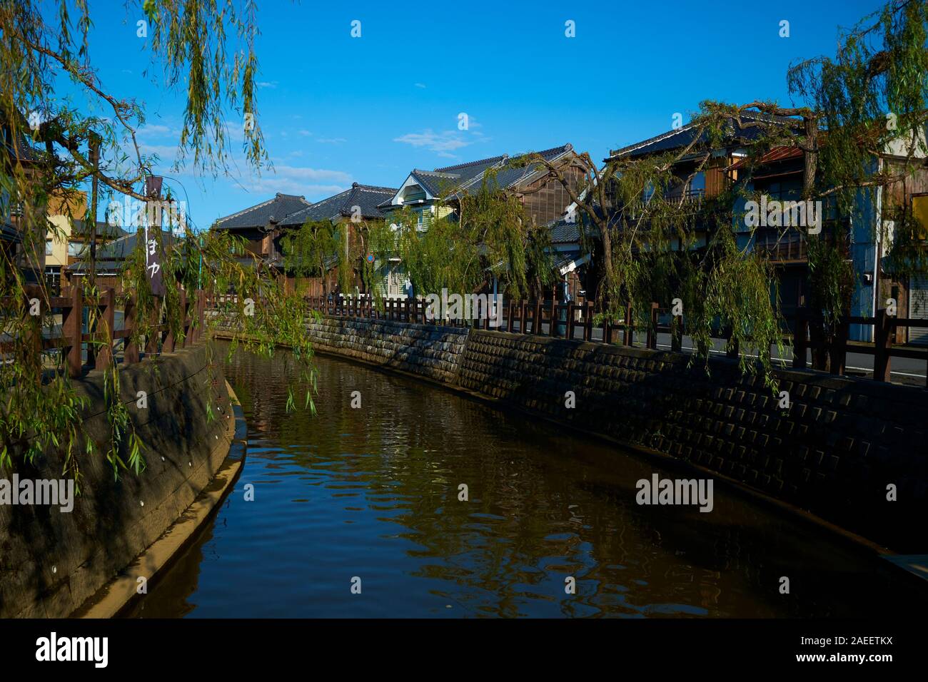 Weeping willow trees line the Ono river canal in the Edo era section of ...