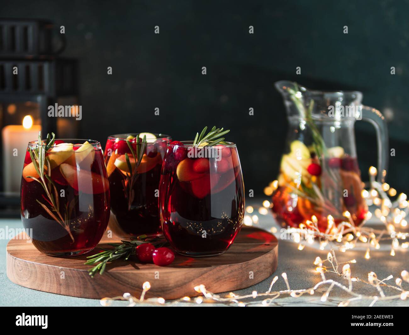 Winter sangria on dark christmas holiday background. Jugful of sangria ...
